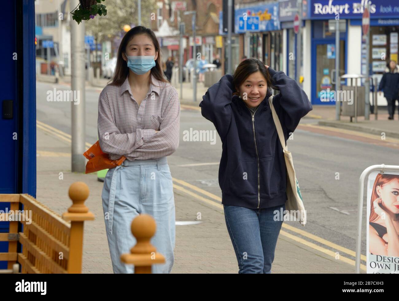 Two young women with face masks hi-res stock photography and images - Alamy