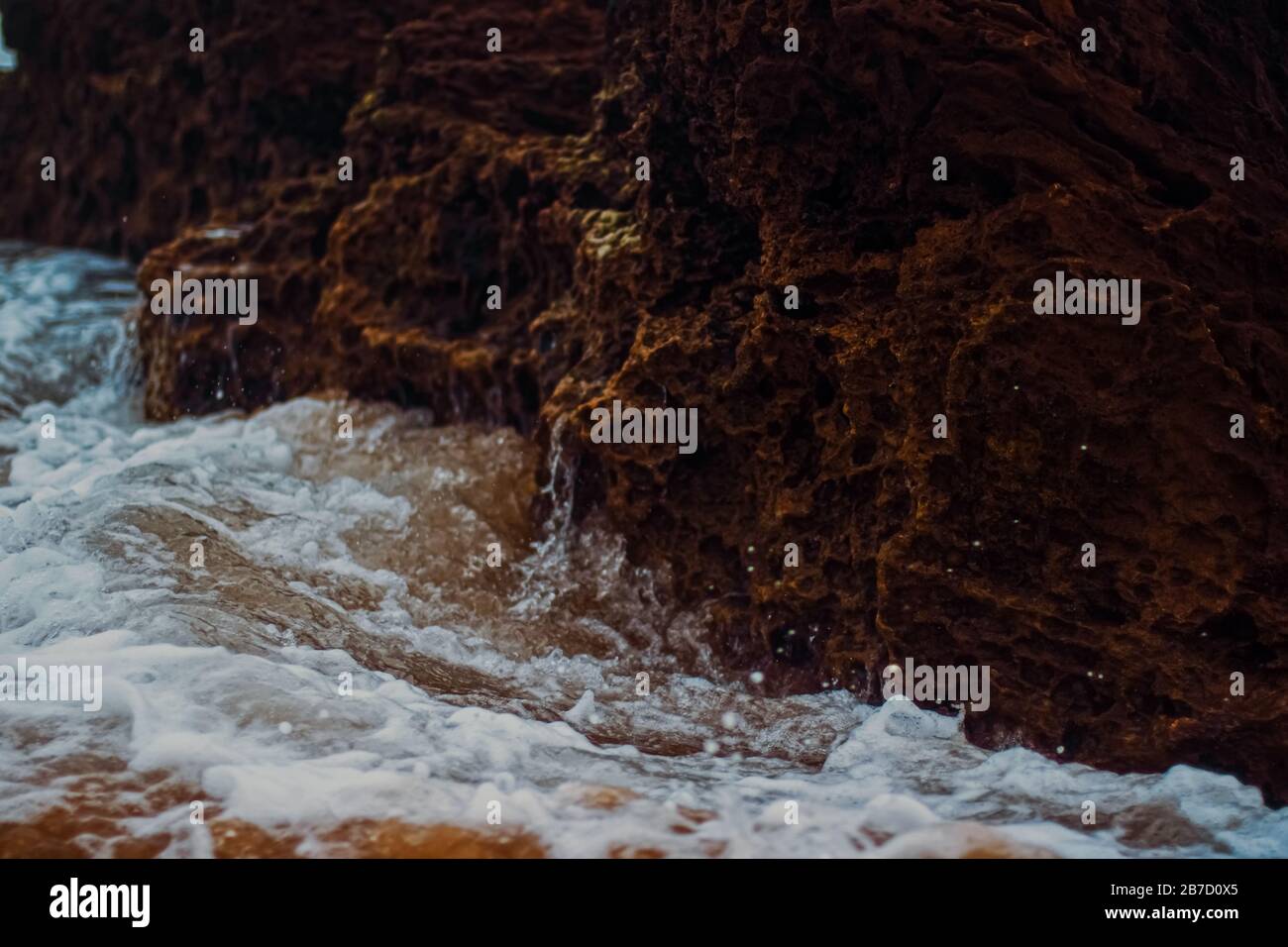 Storm in the ocean, sea waves crashing on rocks on the beach coast ...