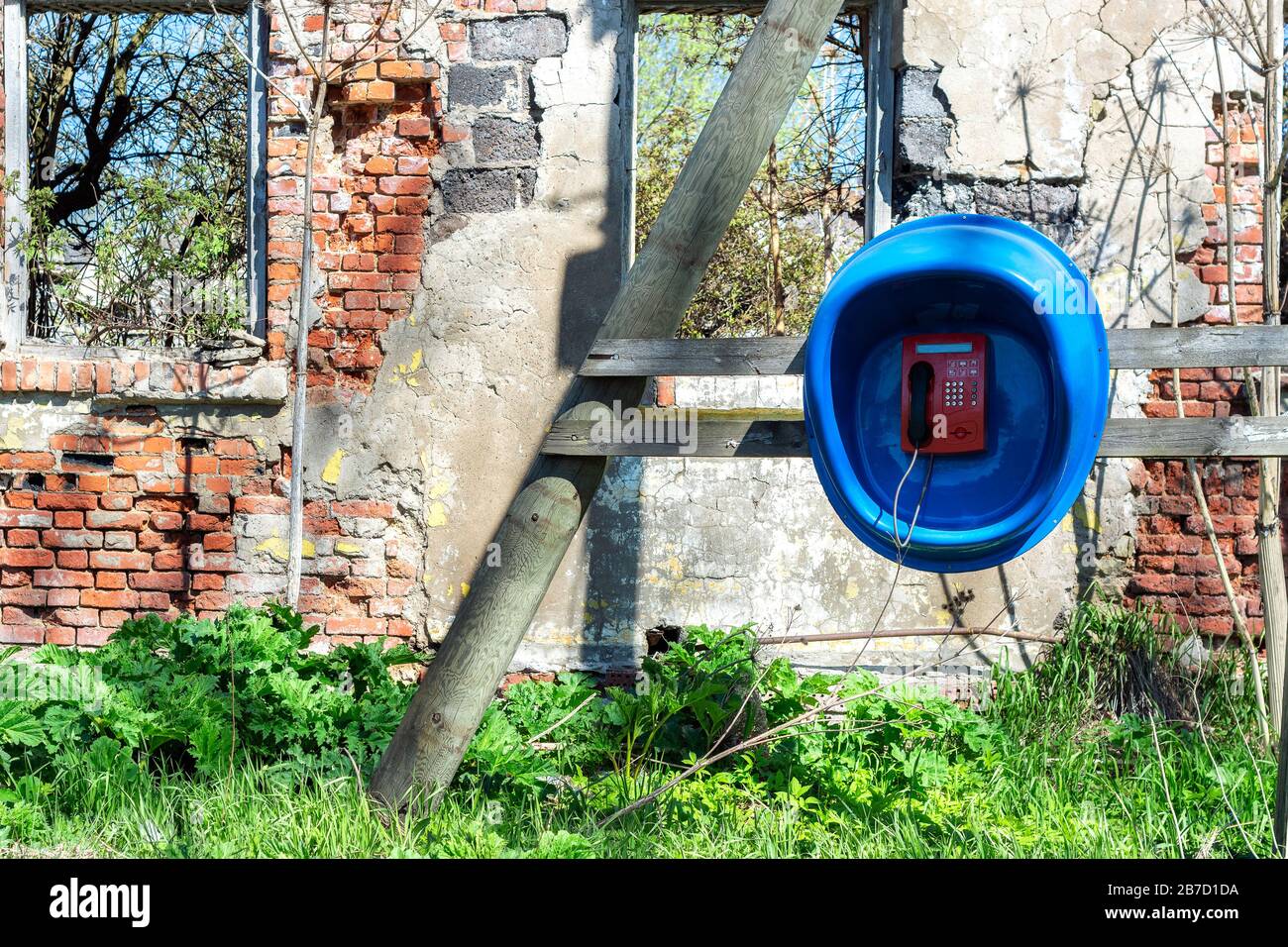 Phone box with weeds hi-res stock photography and images - Alamy