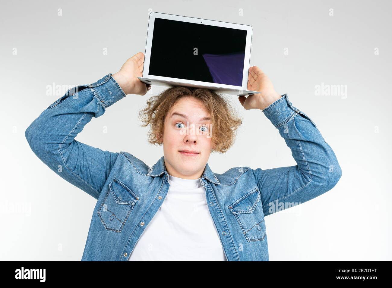 blond guy shows a laptop screen in a template for inserting a website ...