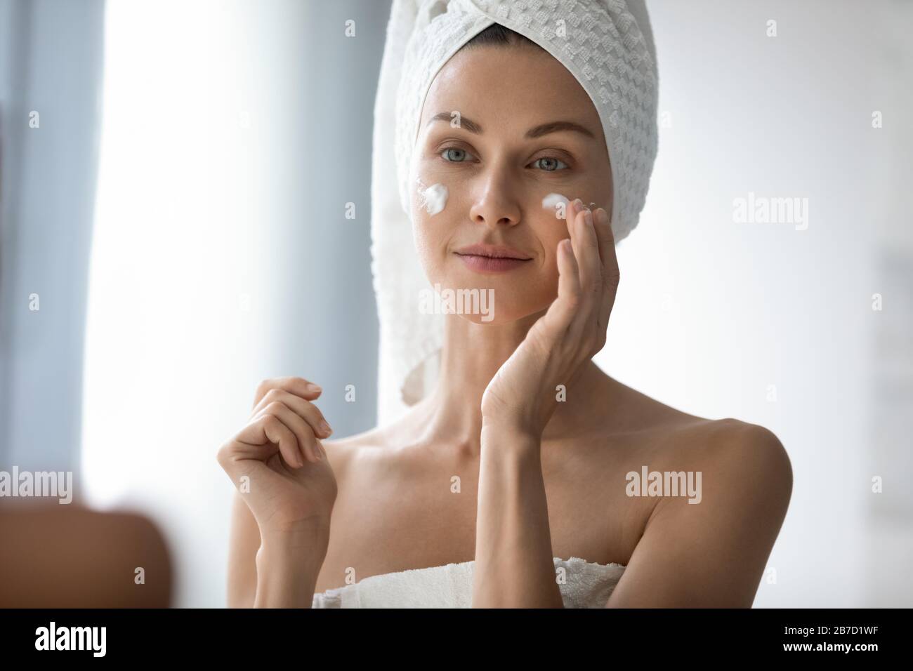 Woman showering home hi-res stock photography and images - Alamy