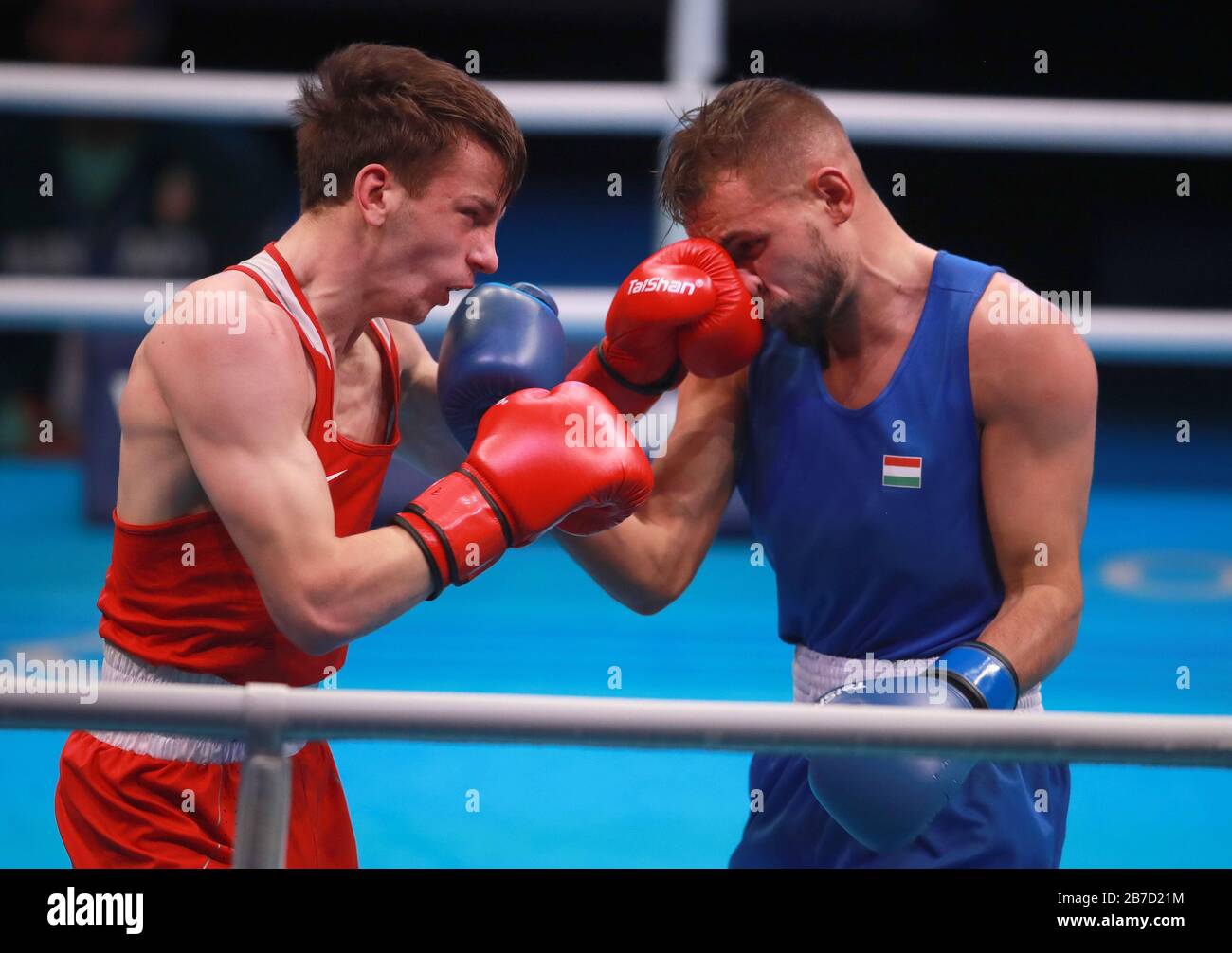 Estonia's Semjon Kamanin (red) in action against Hungary's Milan Fodor ...