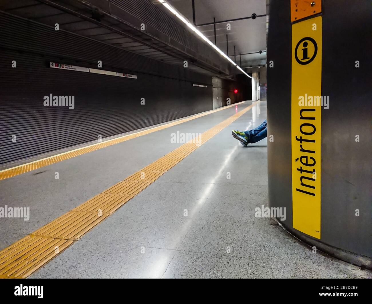 Waiting sitting in the subway with intercom signal Stock Photo - Alamy