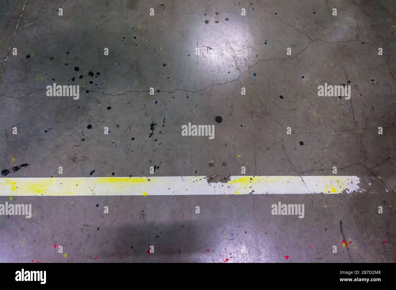 Grey soil with colors paint stains Stock Photo - Alamy