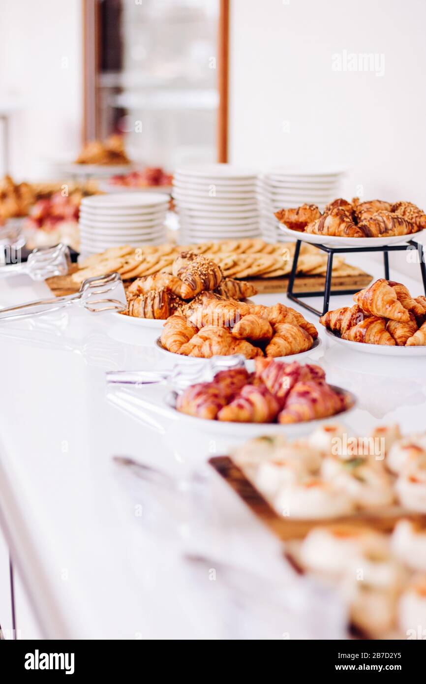 Pastry buffet served at charity event, sweet food and dessert table ...