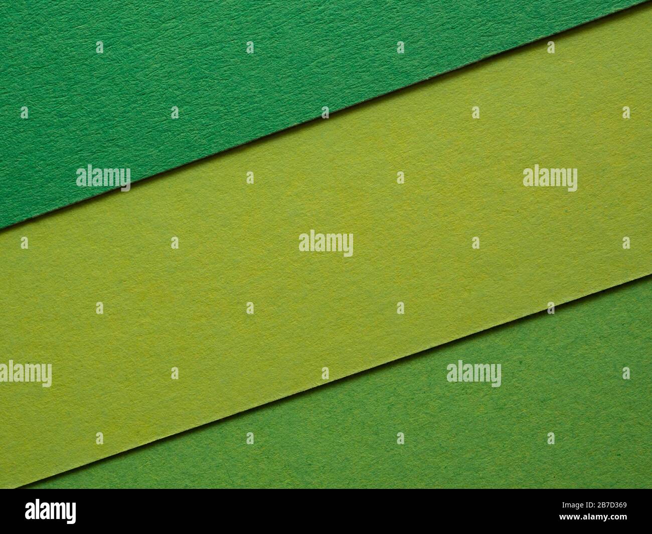 Set of multi-hue sheets of paper. Sheets of multi-colored paper stacked ...