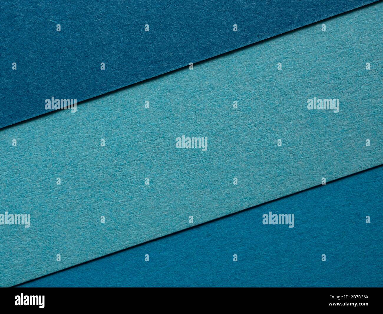 Set of multi-hue sheets of paper. Sheets of multi-colored paper stacked ...