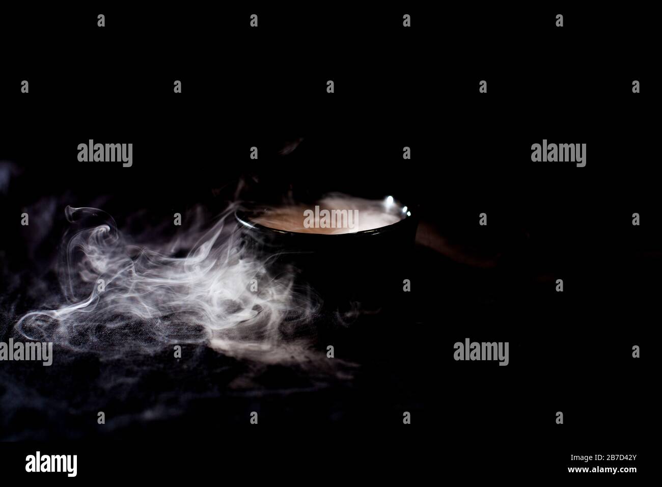 Chemical reaction of dry ice with liquid Stock Photo - Alamy