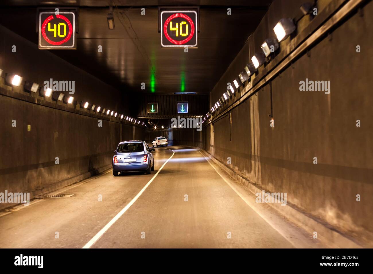 Traffic in a tunnel in the city with signals Stock Photo - Alamy