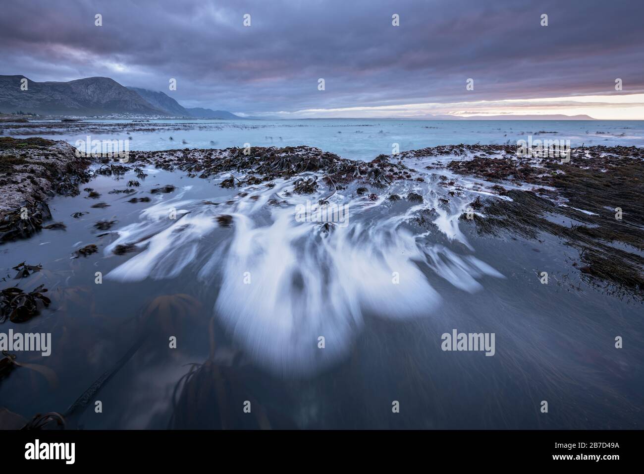 A beautiful early morning seascape photographed on a stormy day before ...
