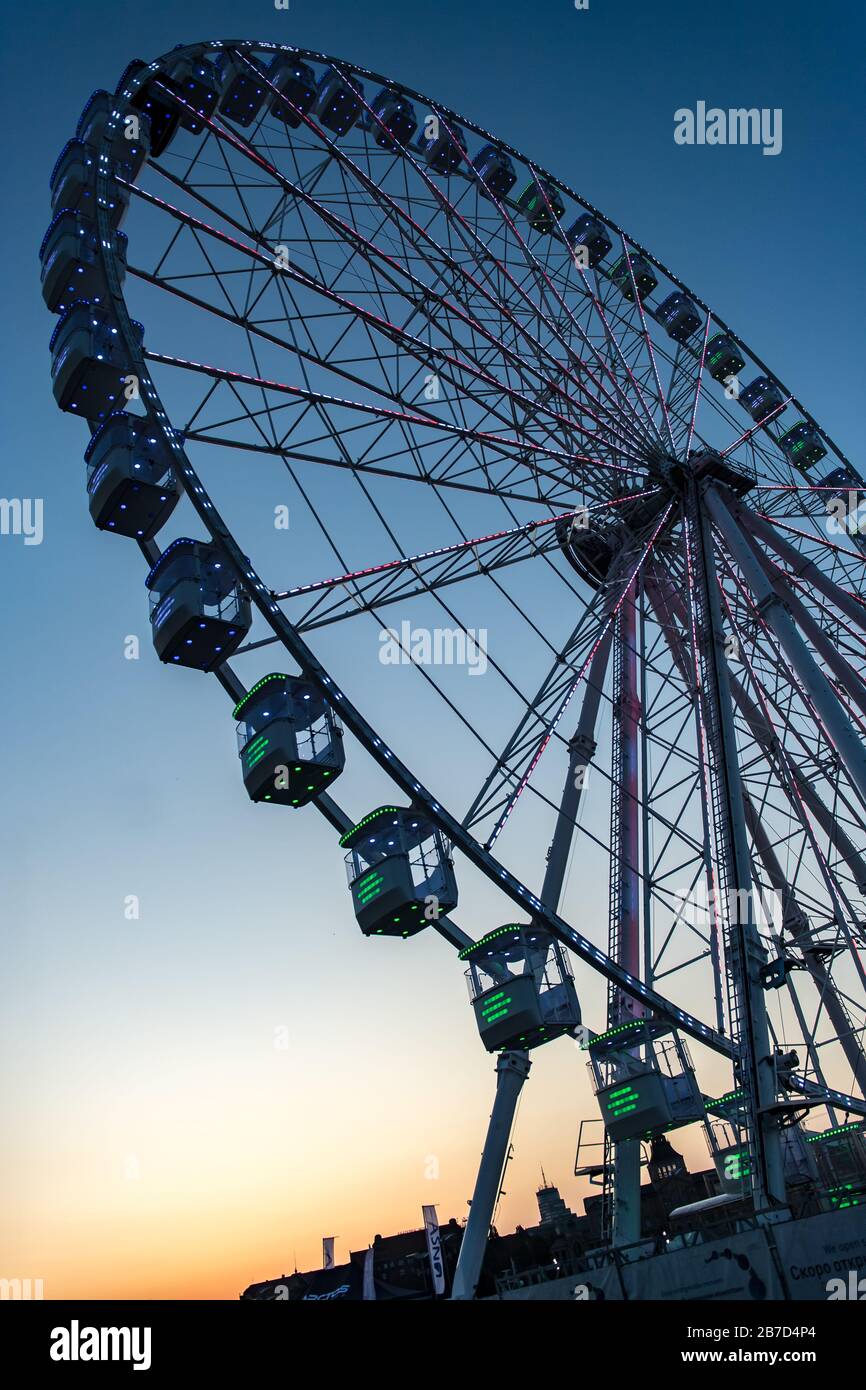 big wheelw amusement park in the evening Stock Photo - Alamy