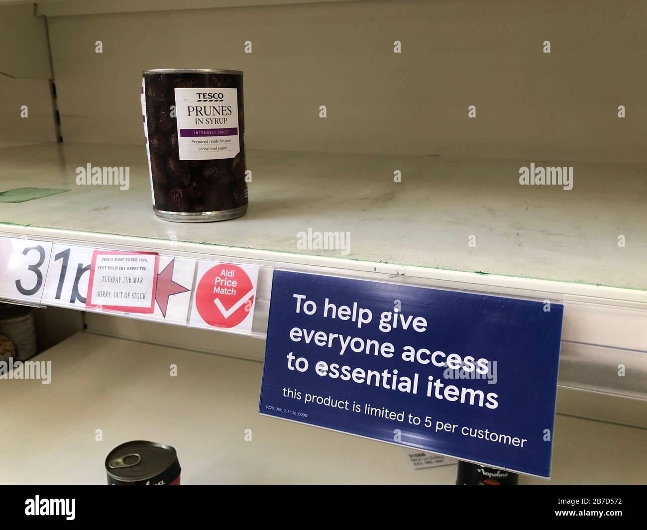 Shelves empty of tomato puree tins at Tesco in Camelon near Falkirk, as ...