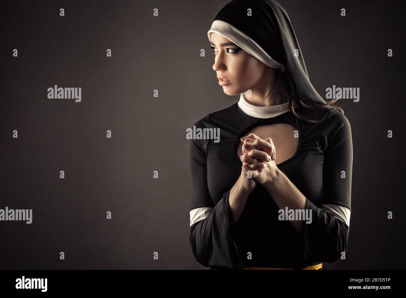 beautiful nun prays to god Stock Photo - Alamy
