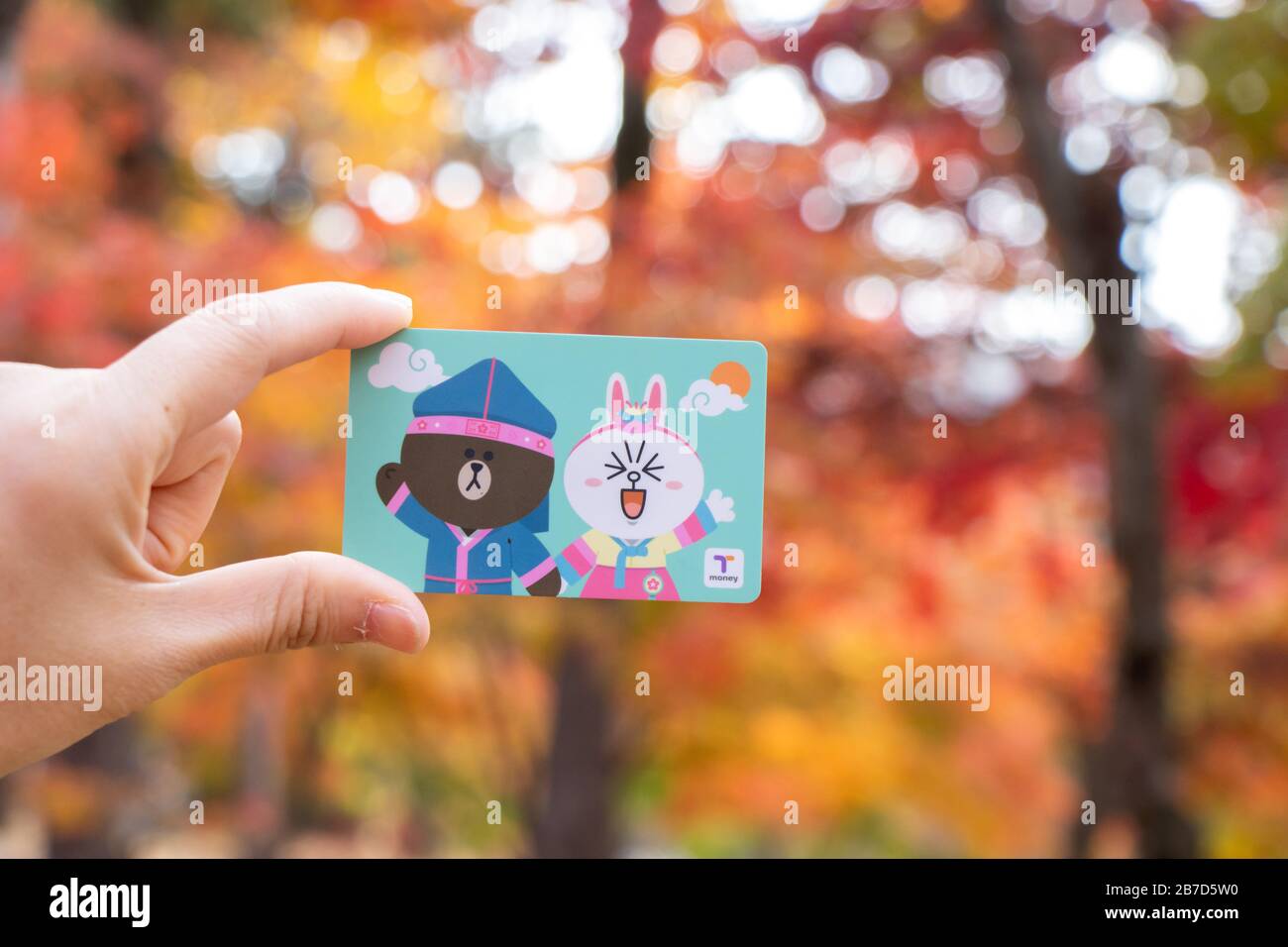 Seoul, South Korea- Oct 24, 2019 : Traveller hand hold t money card ...