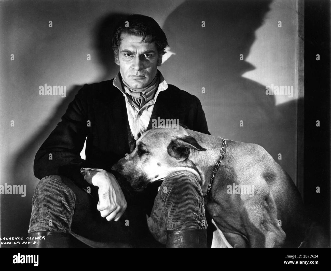 LAURENCE OLIVIER Portrait as Heathcliff with his Dog in WUTHERING ...
