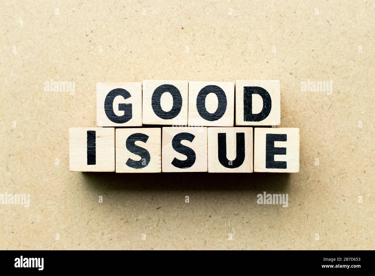 Letter block in word good issue on wood background Stock Photo - Alamy