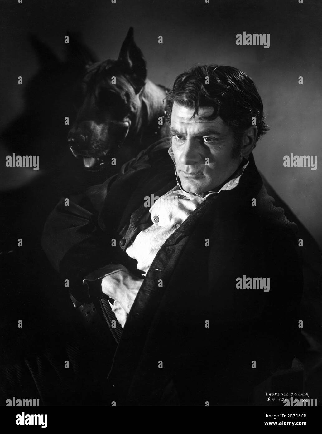 LAURENCE OLIVIER Portrait as Heathcliff with his Dog in WUTHERING ...