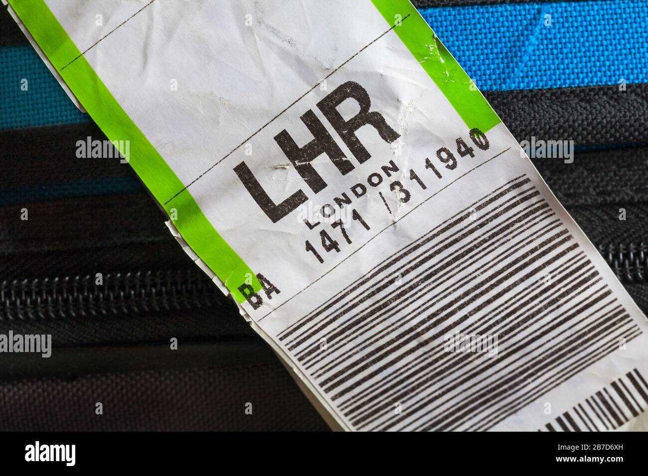 ba-british-airways-luggage-label-stuck-on-luggage-for-lhr-london