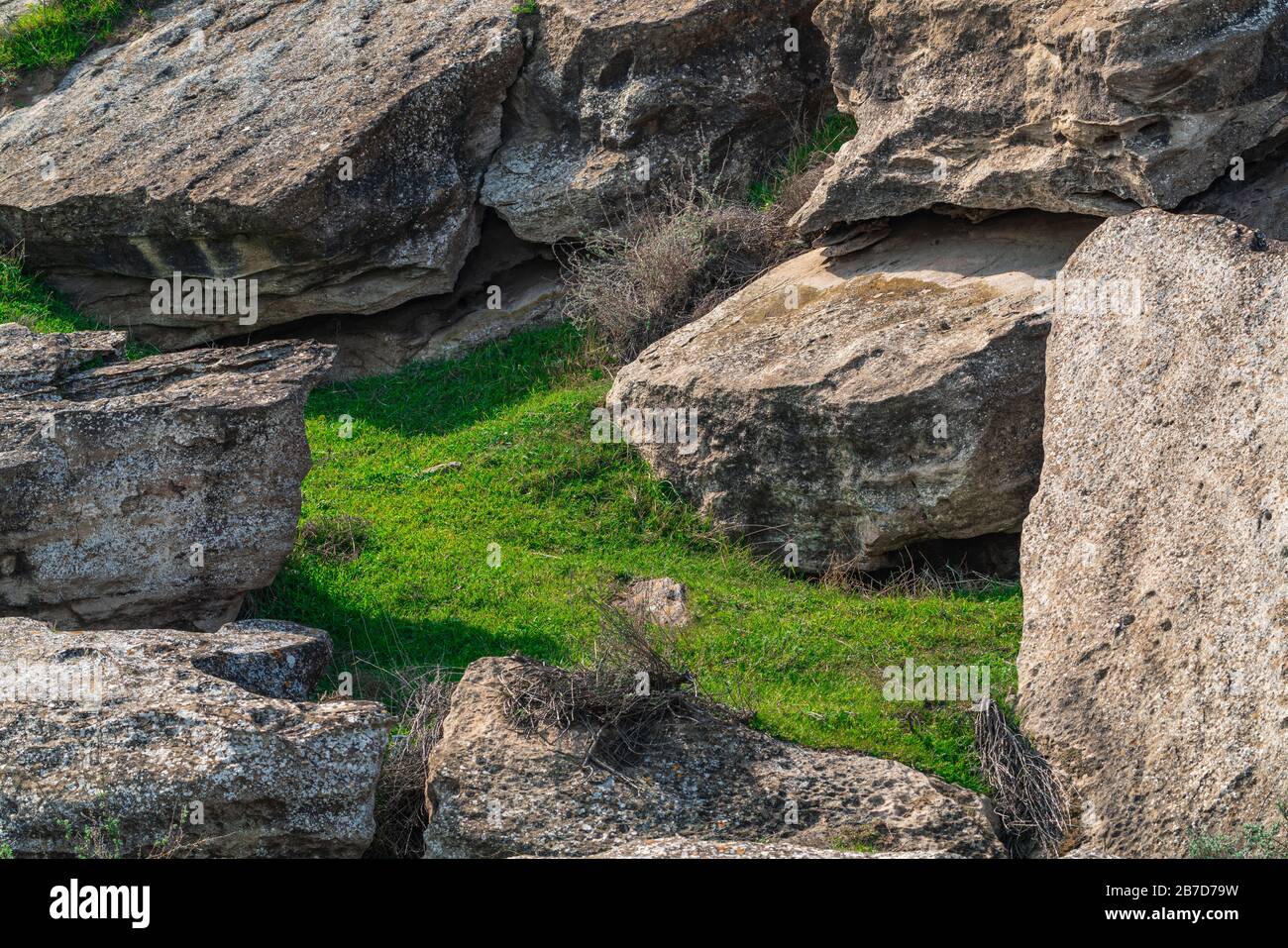Rock fragments on the shore Stock Photo - Alamy