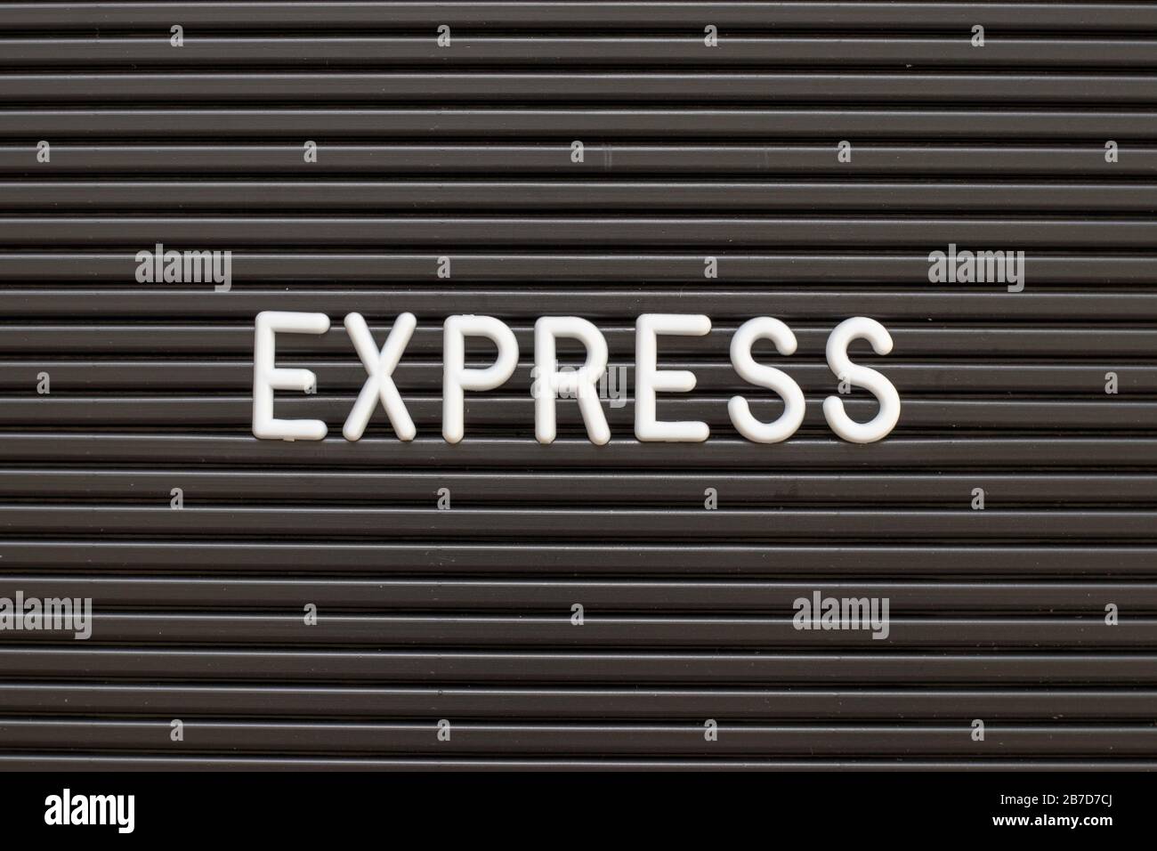 Black color felt letter board with white alphabet in word express ...