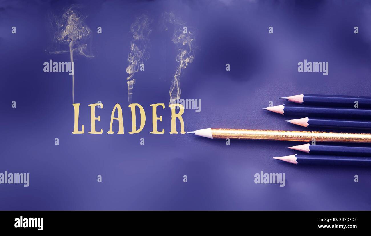 Leader word in golden chalk handwriting on classic blue background ...