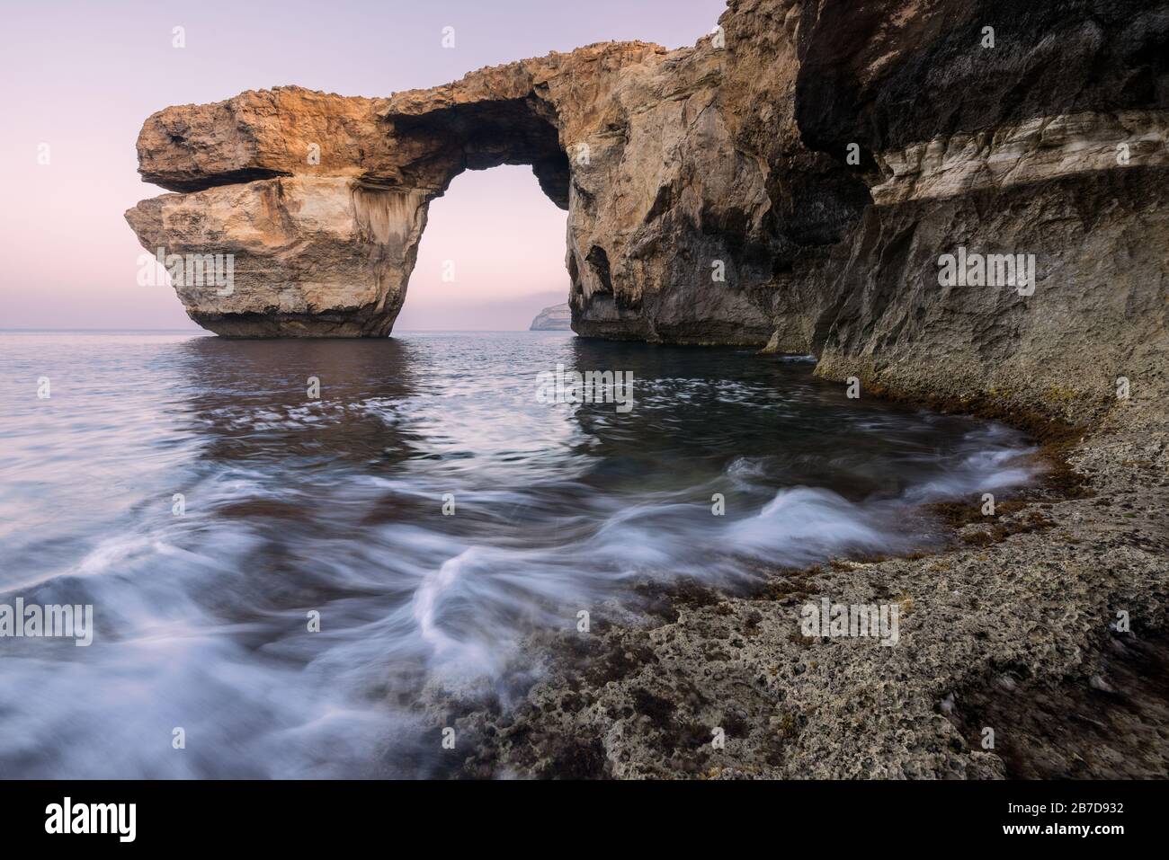 A beautiful early morning photograph of the Azure Window rock arch on ...