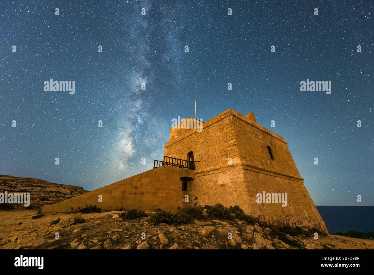 A beautiful Milky Way night sky photograph of the Dwejra Watch Tower on ...