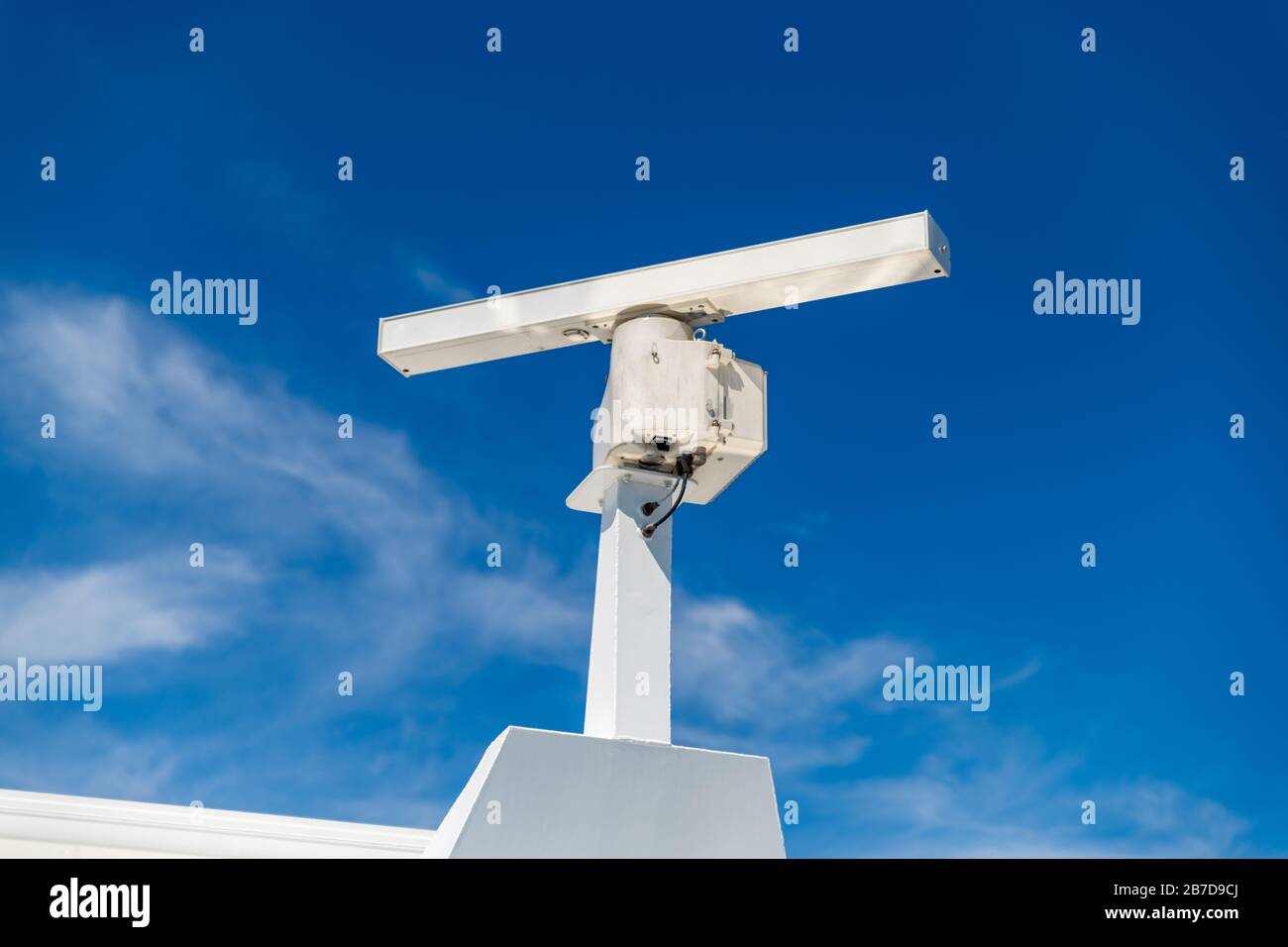 Small radar on the ship, small navigation system. Background is blue ...