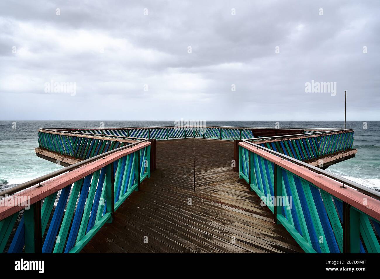 Old wooden observation platform at cloudy seaside Stock Photo - Alamy