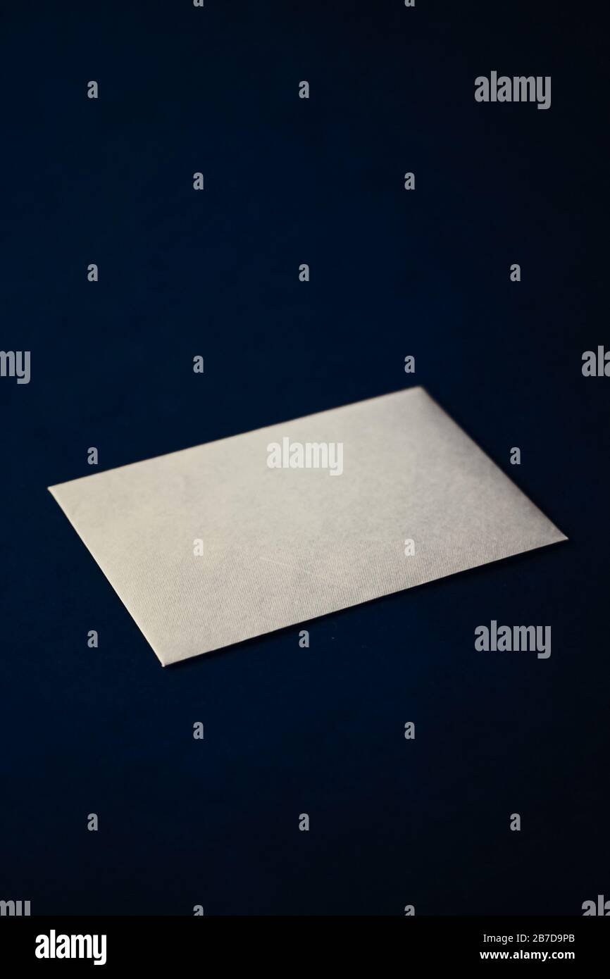 Blank beige paper card on blue background, premium business and luxury ...