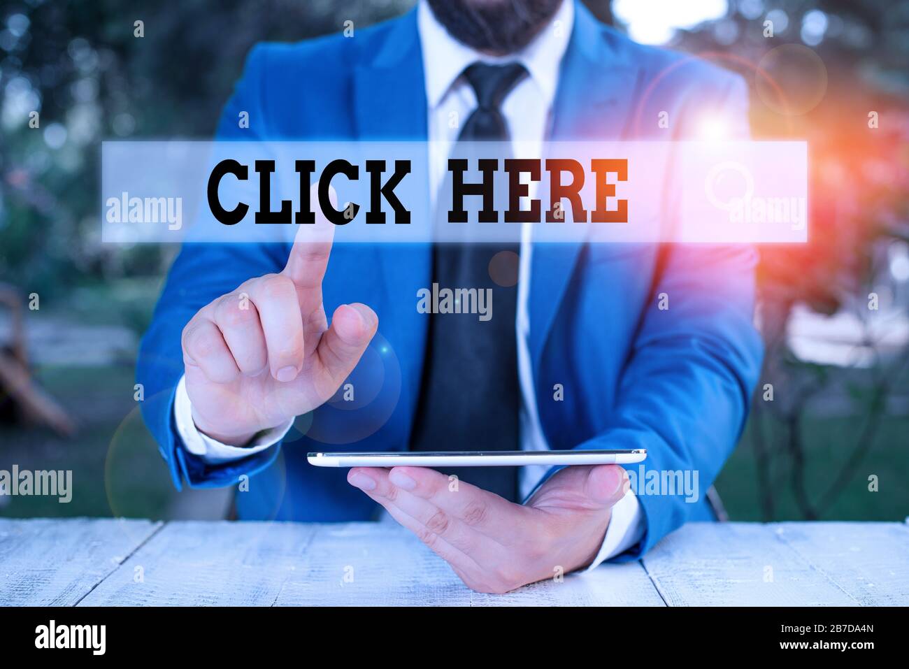 Writing note showing Click Here. Business concept for carry out a ...