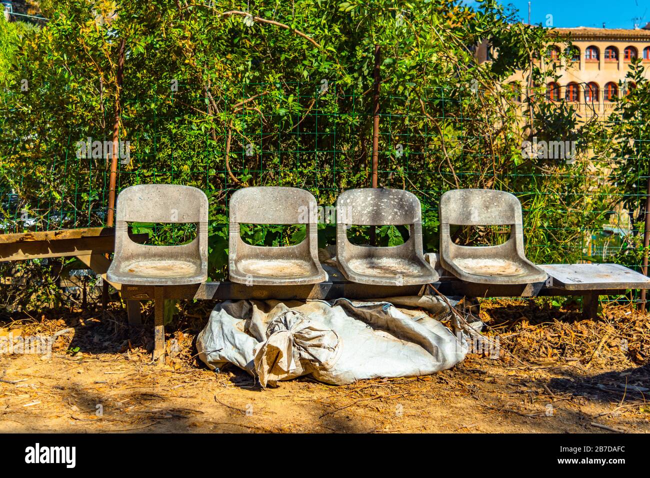 Abandoned plastic white chair hi-res stock photography and images - Alamy