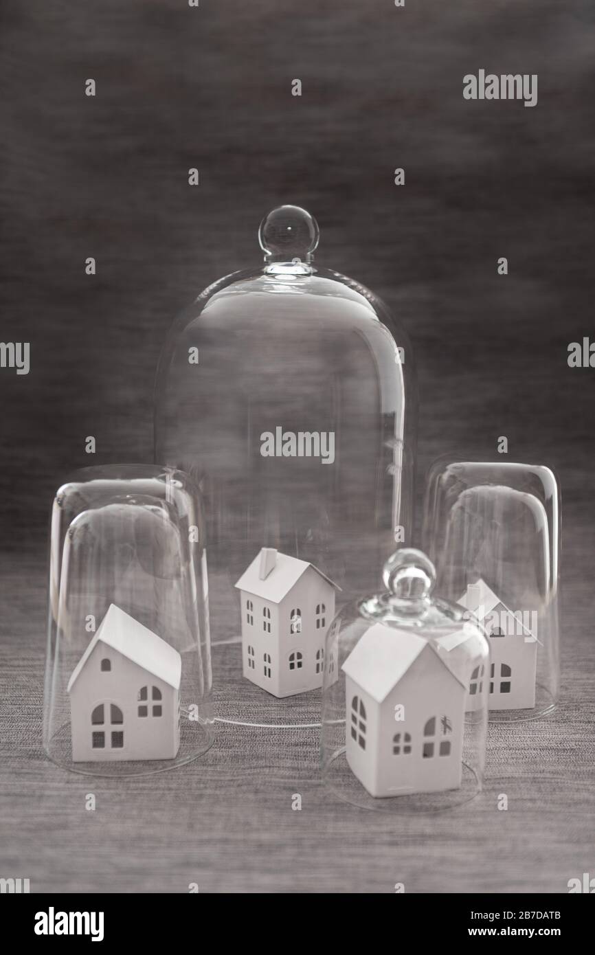 Little house in bell jar, isolation, protection concept Stock Photo - Alamy