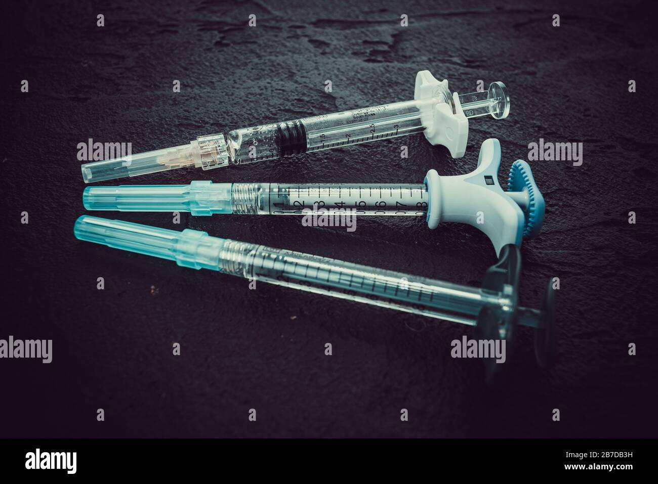 A set of different syringes on lack. Face Cosmetics Injecting Stock ...