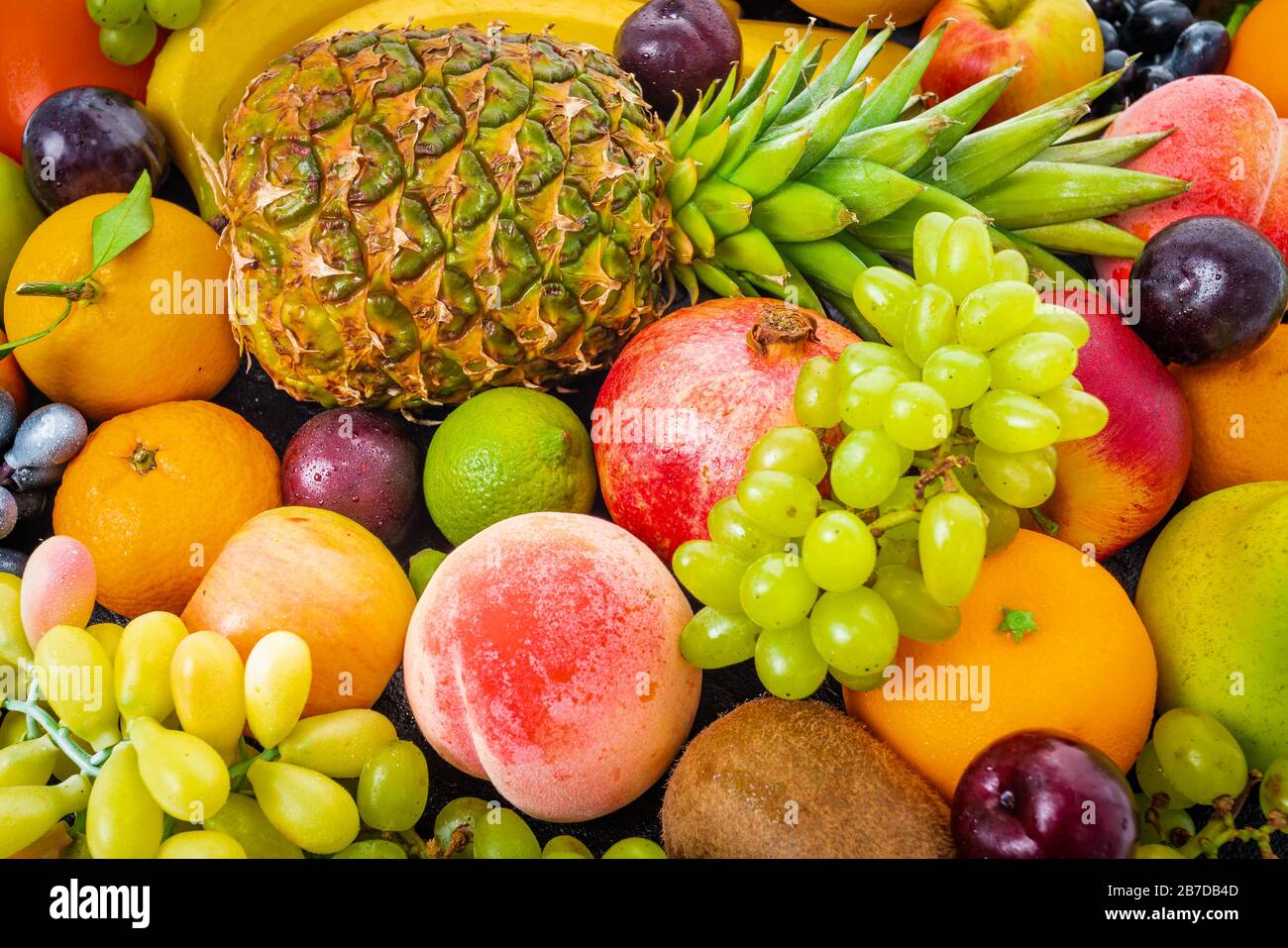 composition with a lot of differrent fruits. exotic fruits Stock Photo ...