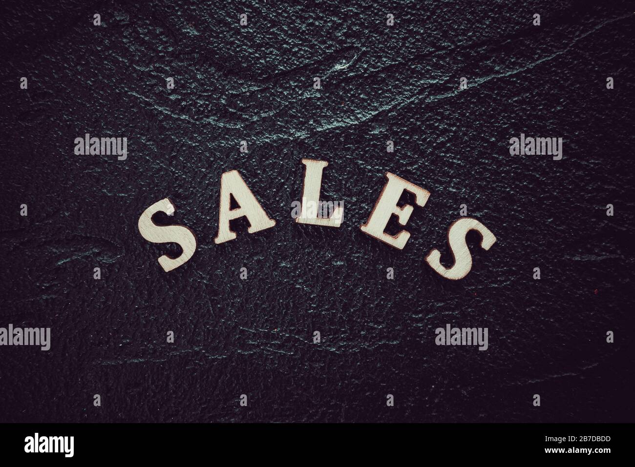 Sale Text On Black Background. Concept of sales Stock Photo - Alamy