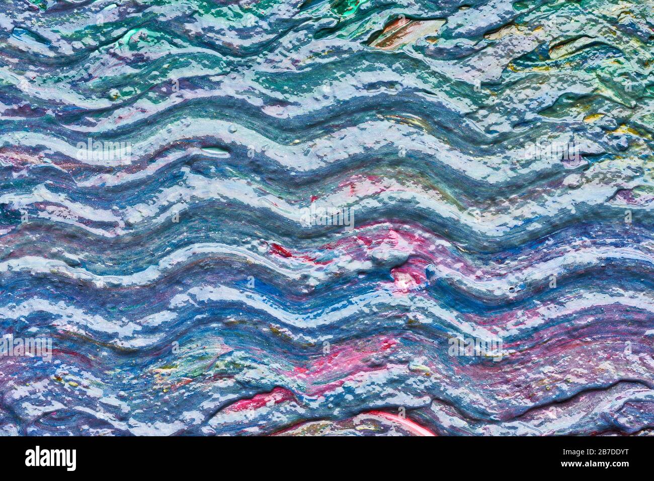 Texture and strokes of multi-color acrylic paint with sparkles on a ...