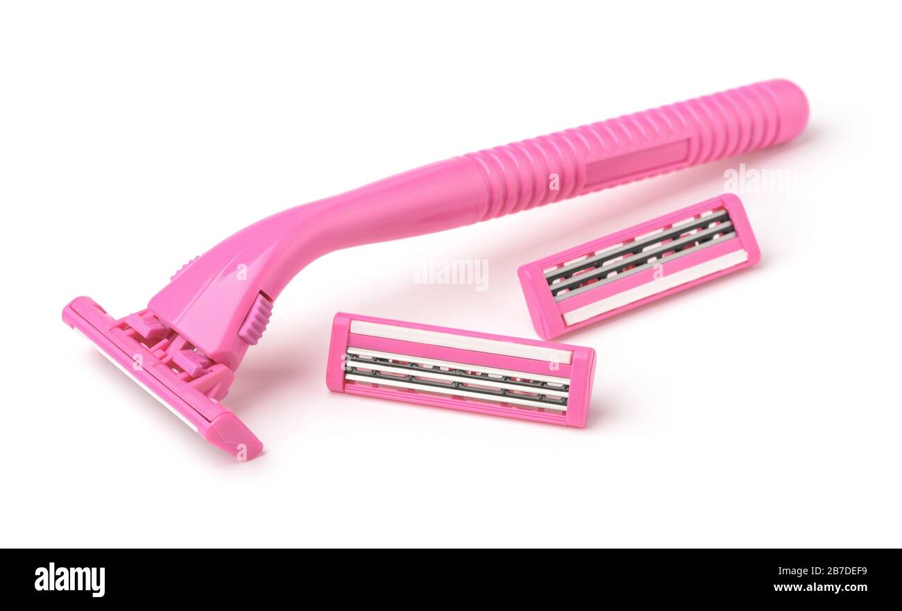 Pink shaving razor and replacement razor heads isolated on a white ...