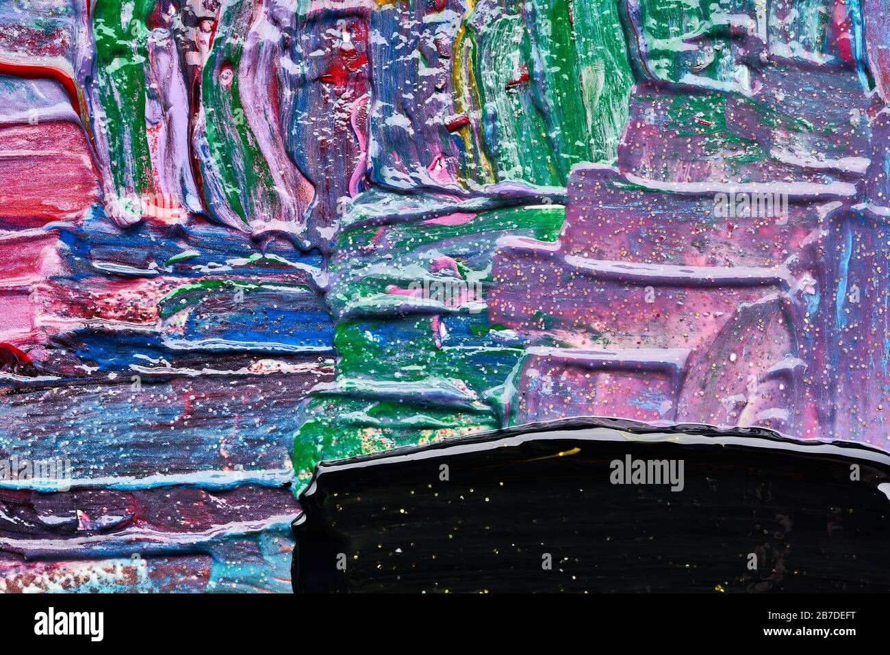 Texture and strokes of multi-color acrylic paint with sparkles on a ...
