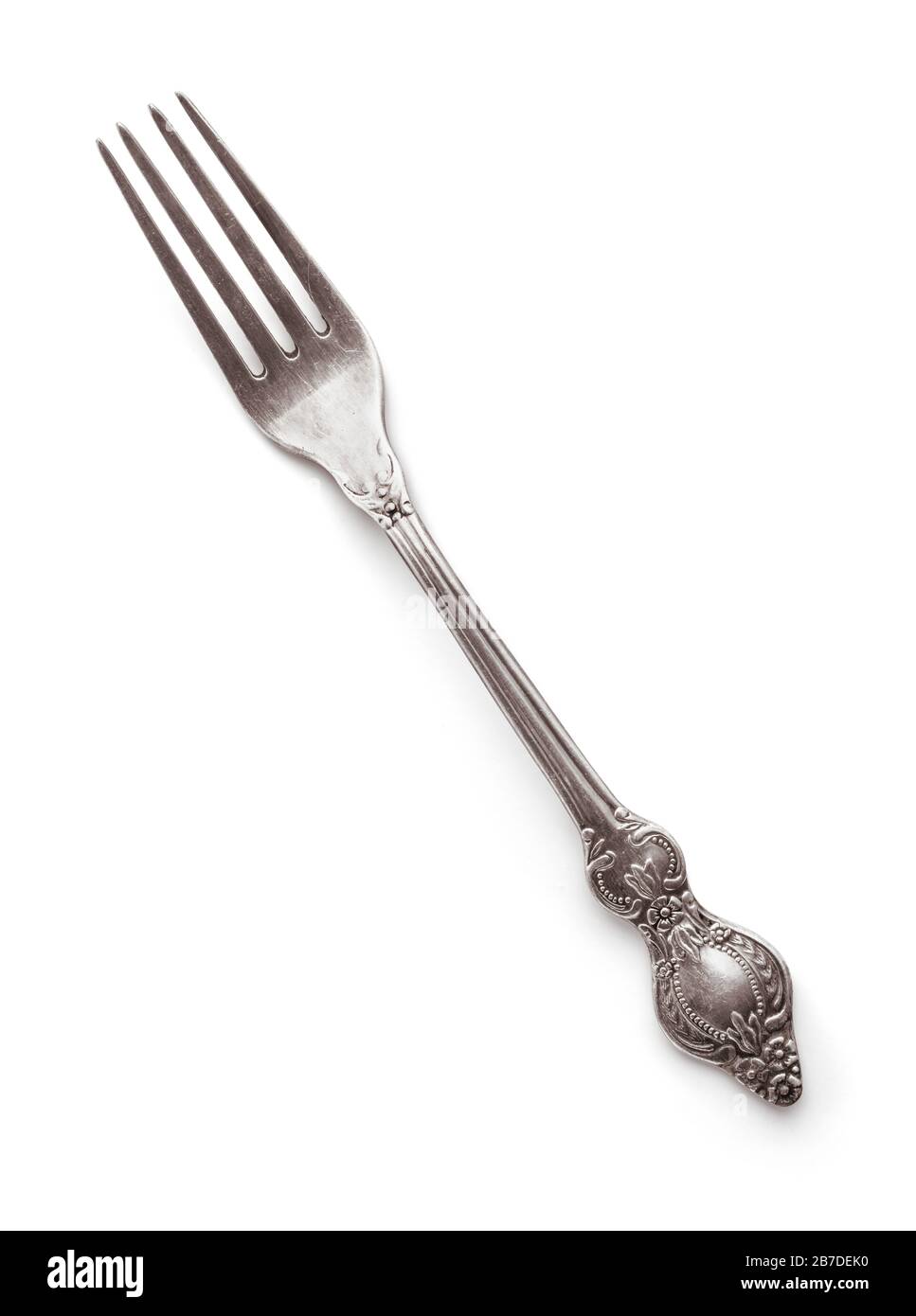 Old silver fork isolated on white Stock Photo - Alamy