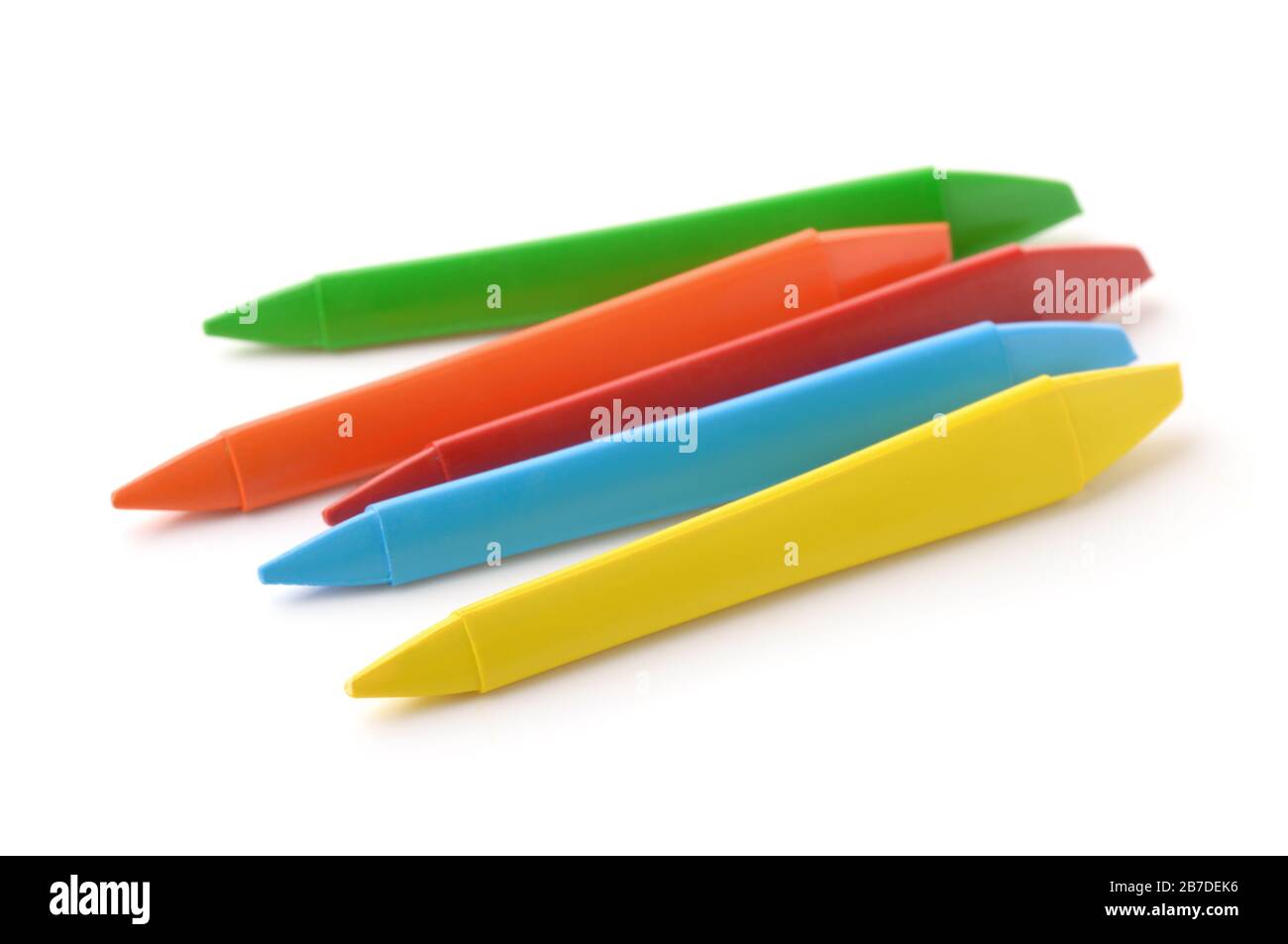 Colorful plastic double sided crayons isolated on white Stock Photo - Alamy