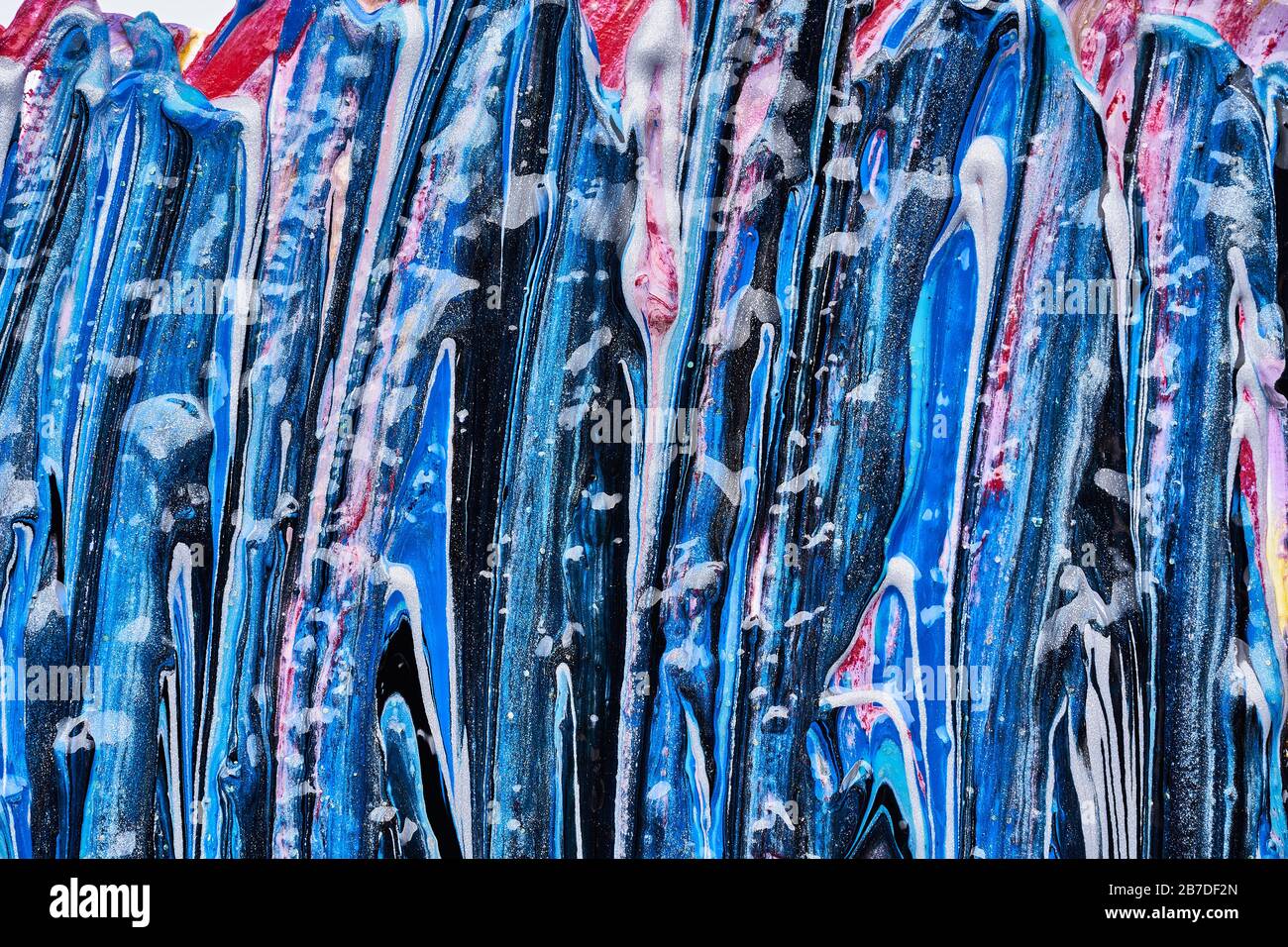 Texture and strokes of multi-color acrylic paint with sparkles on a ...