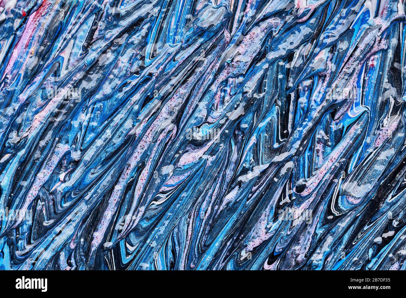 Texture and strokes of multi-color acrylic paint with sparkles on a ...