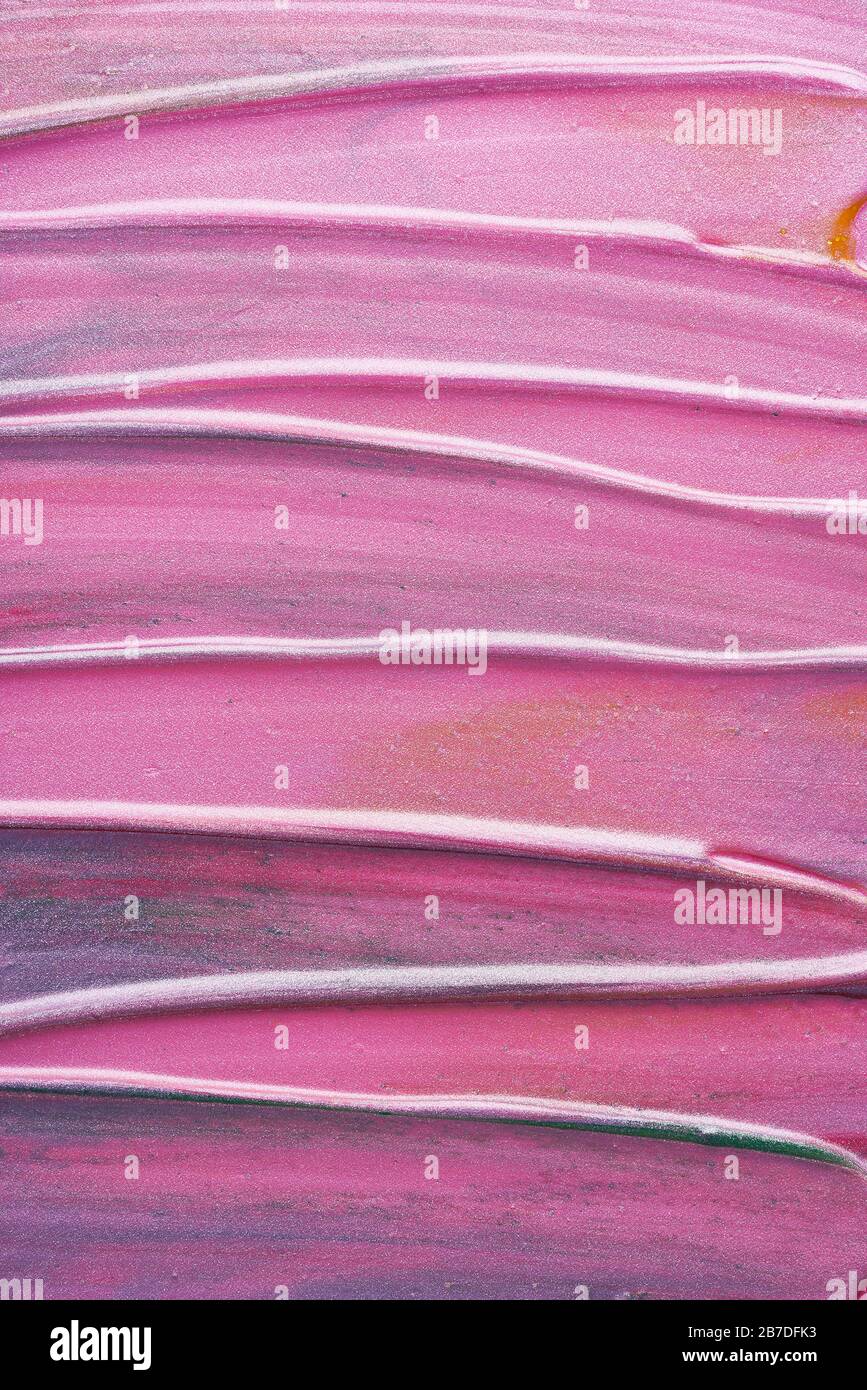 Texture and strokes of multi-color acrylic paint with sparkles on a ...