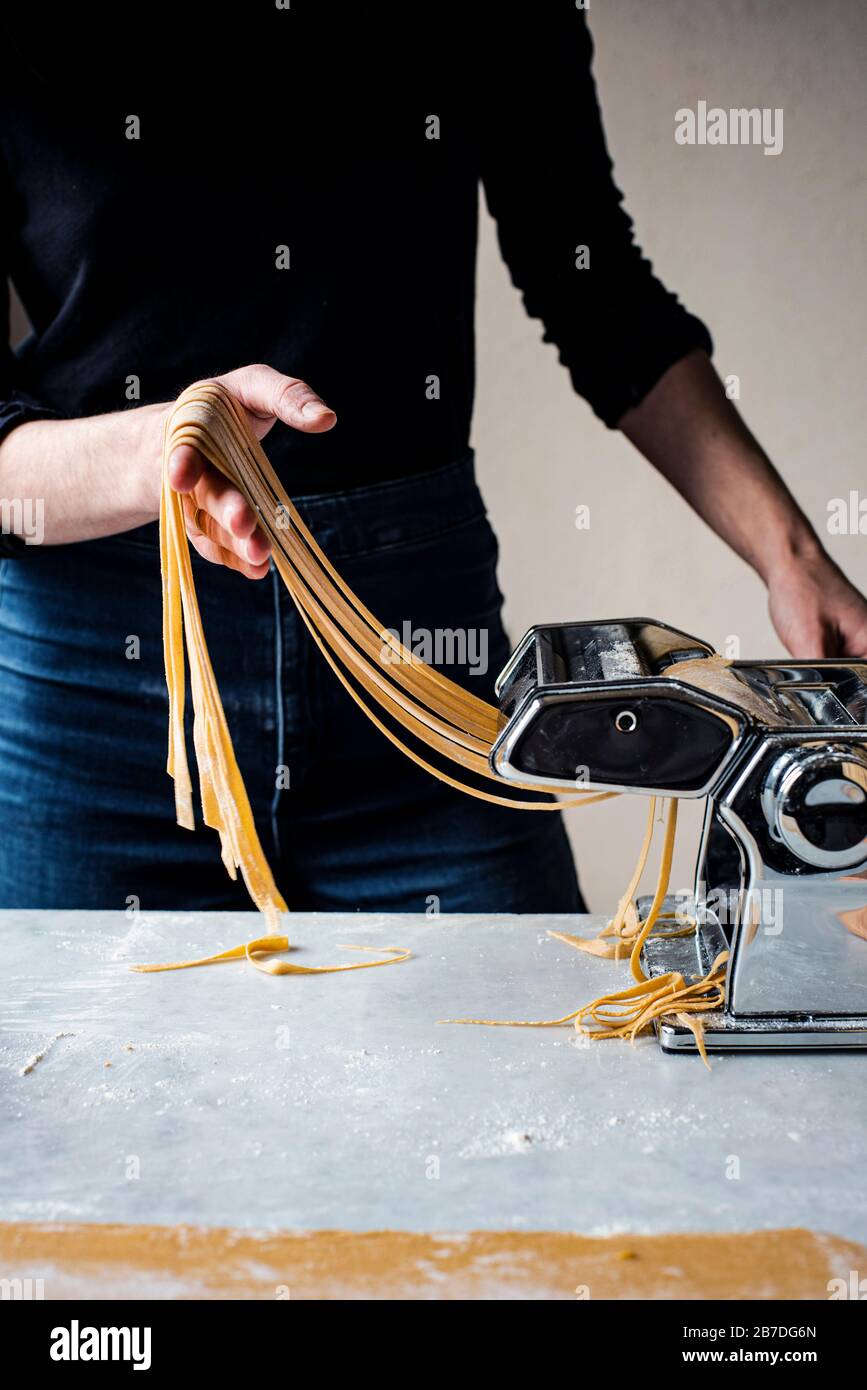 Woman Making Fresh Pasta in a kitchen Stock Photo - Alamy
