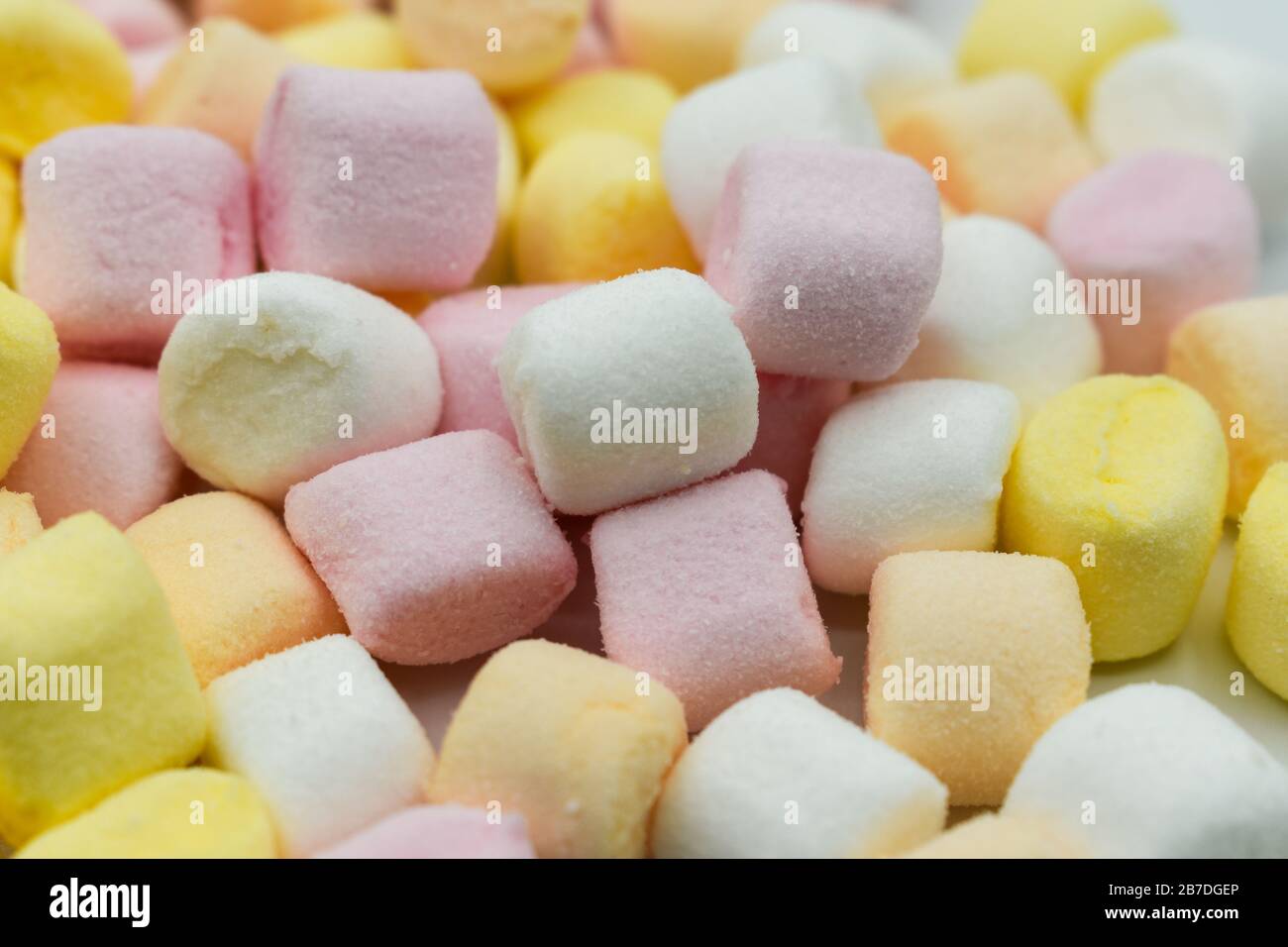 Colorful mini marshmallows isolated on white background, macro. Fluffy ...