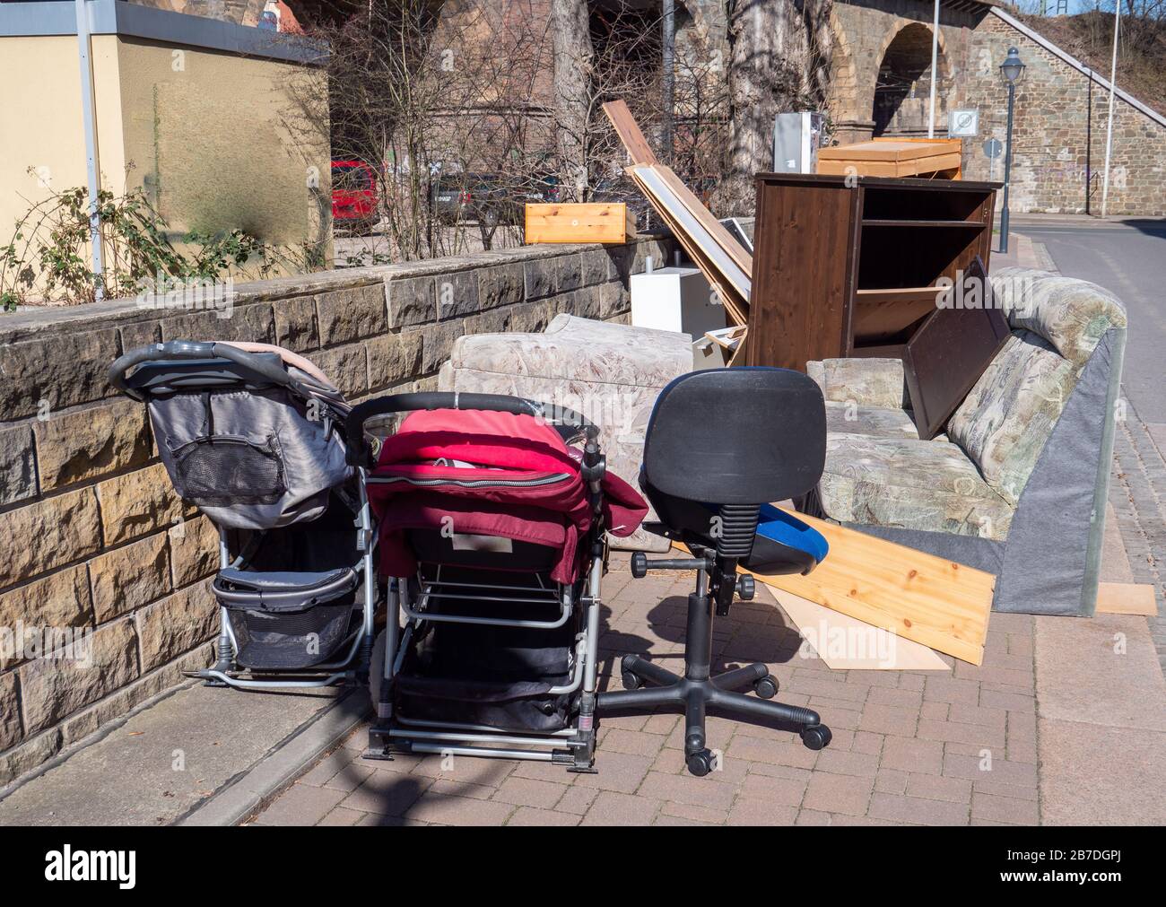 Bulky waste stands on the street Stock Photo - Alamy