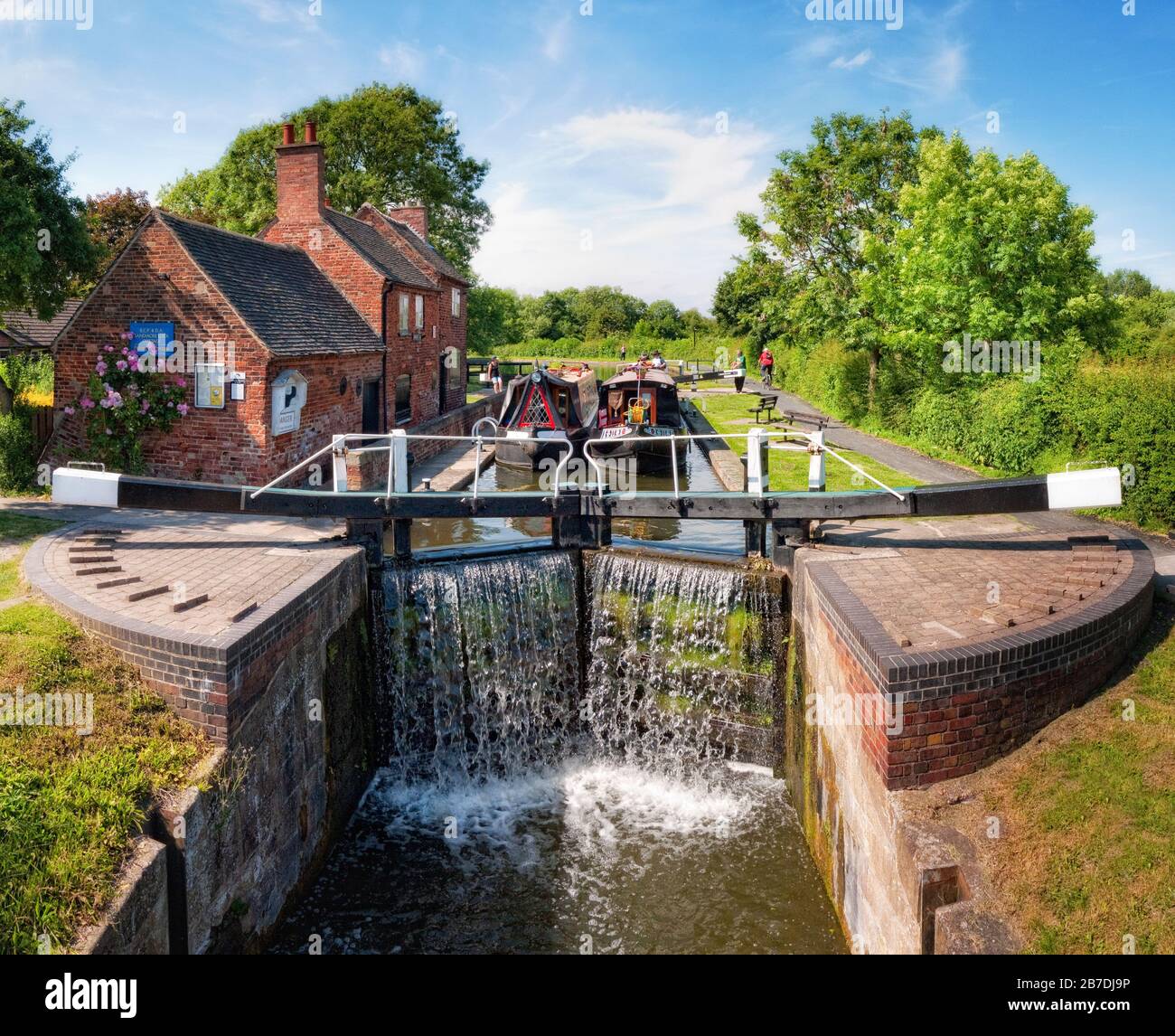 Two narrowboats descending Sandiacre Lock on the Erewash Canal, near ...