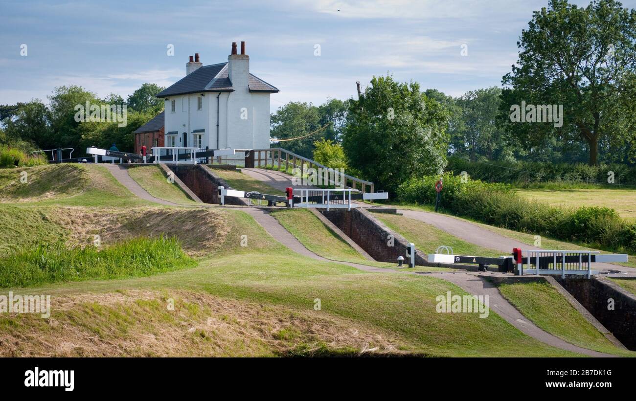The top lock cottage and locks on the Foxton Flight of the Grand Union ...