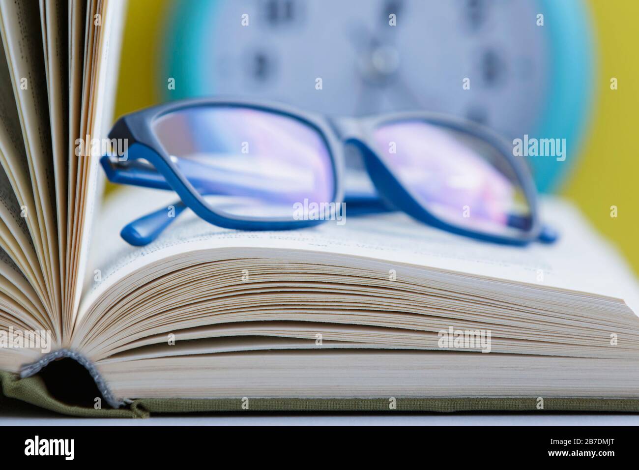 Open book with glasses hi-res stock photography and images - Alamy